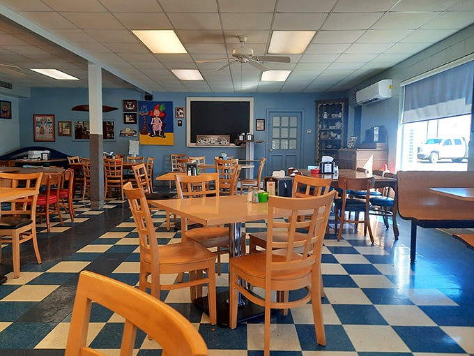 Blue walls and checkered floors create the backdrop for countless family meals and roadtrip pit stops – a dining room that feels like coming home.