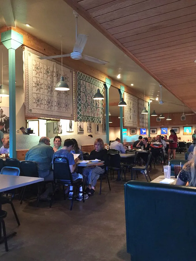 The dining room hums with the universal language of good food—forks pausing mid-air as diners close their eyes to savor that perfect bite.