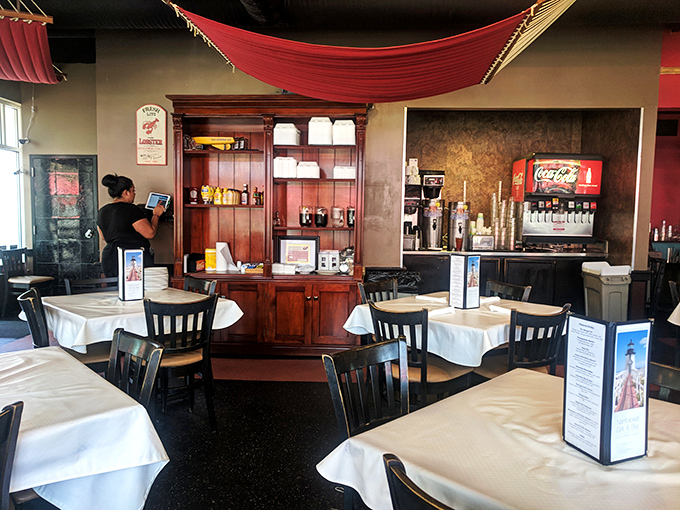 White tablecloths signal "this is fancy" while the casual vibe whispers "but we're still fun"—the restaurant equivalent of wearing sneakers with a suit.