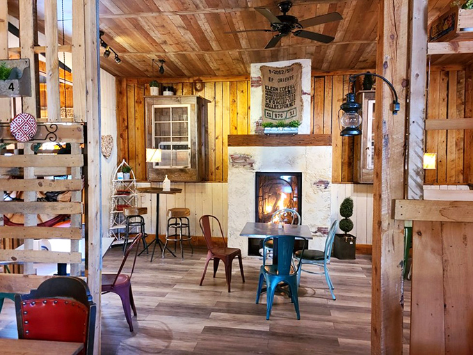 The dining room feels like that cool friend's cabin you wish you visited more often. Warm wood, dancing flames, and the promise of good food.