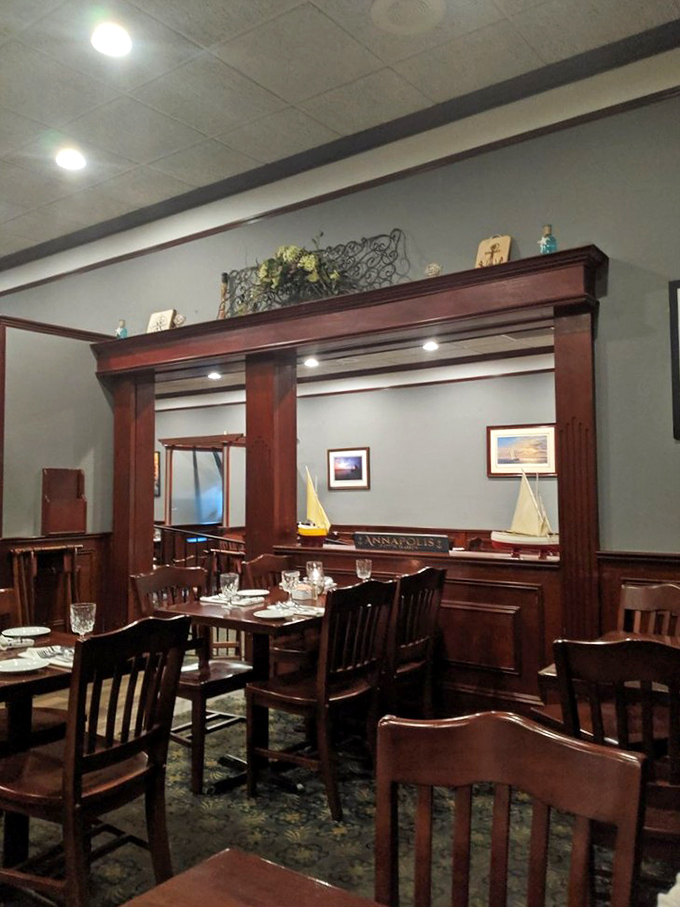 Nautical touches and rich woodwork transform this dining area into a captain's quarters where the treasures are edible.