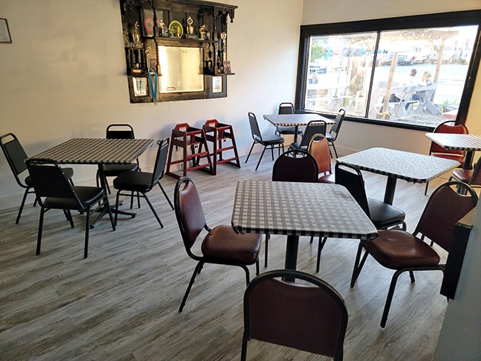 The dining room's minimalist charm lets you focus on what matters – that incredible chicken waiting just steps away.