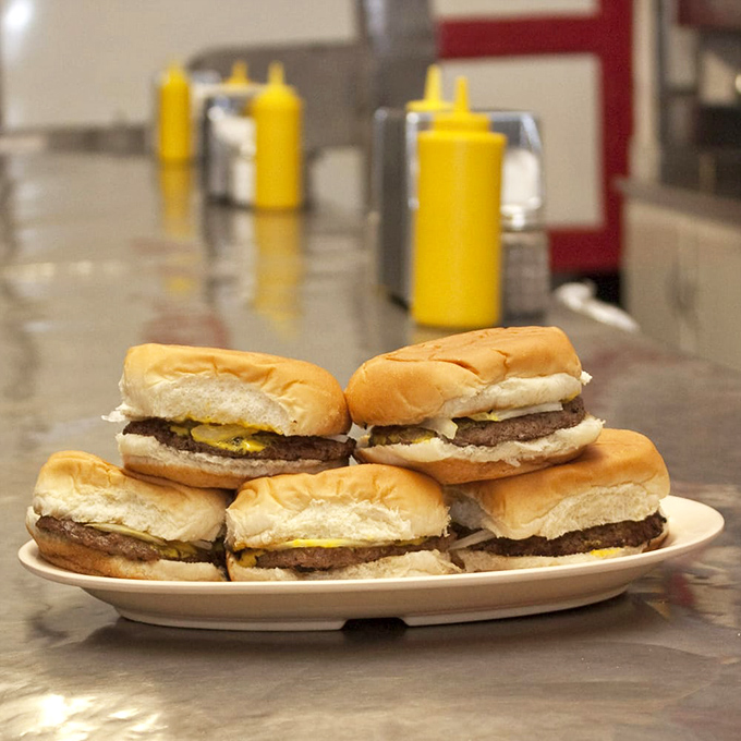 These sliders aren't trying to be trendy; they've been doing their thing since before "small plates" became restaurant-speak for "less food, same price."