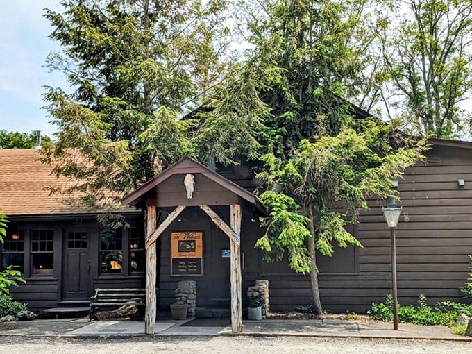Walpack Inn's cabin exterior—where "rustic charm" and "carnivorous delight" have been having a lovely romance for decades.