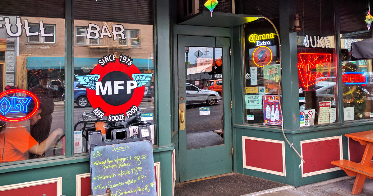 Sunlight catches the vintage storefront of My Father's Place – where Portland's most authentic dive experience awaits with zero pretension and maximum character.