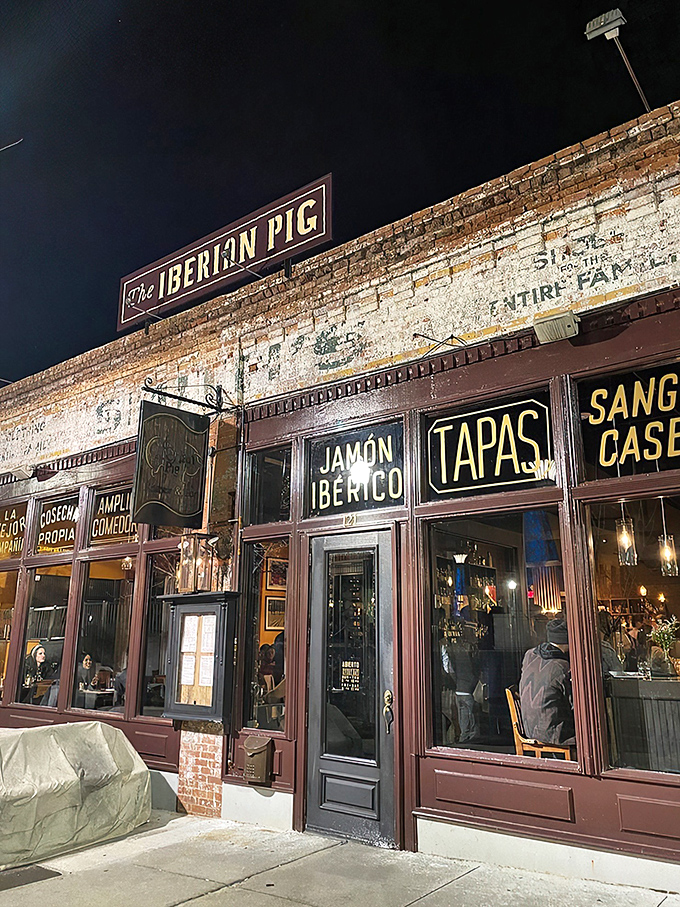 The historic brick façade with its vibrant signage beckons like an old friend inviting you for drinks on a perfect Georgia evening.