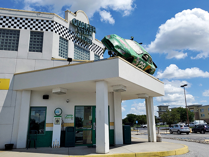 Inside, cars don't just inspire the decor—they ARE the decor. An entire vehicle suspended from the ceiling turns traditional restaurant design upside down, quite literally.