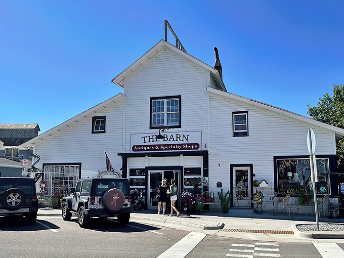 That iconic rusty sign isn't just weathered—it's a beacon calling to treasure hunters everywhere. The Barn's exterior promises adventures within.