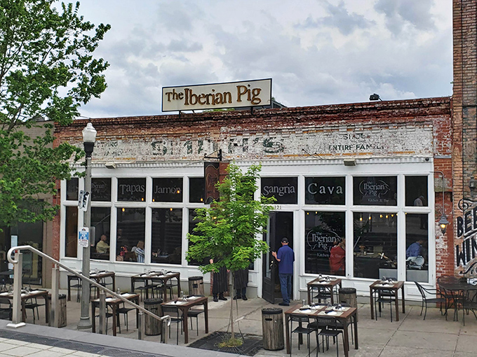 The historic brick façade with its vibrant signage beckons like an old friend inviting you for drinks on a perfect Georgia evening.