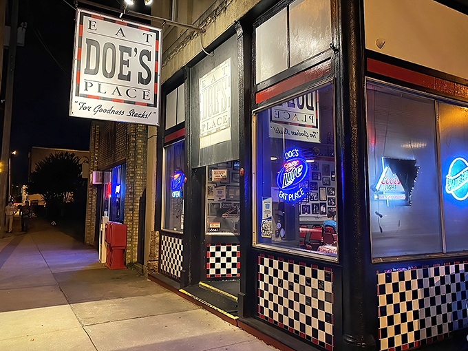 The unassuming exterior of Doe's Eat Place hides culinary greatness within, like finding a diamond in your backyard. That yellow truck knows what's up! 
