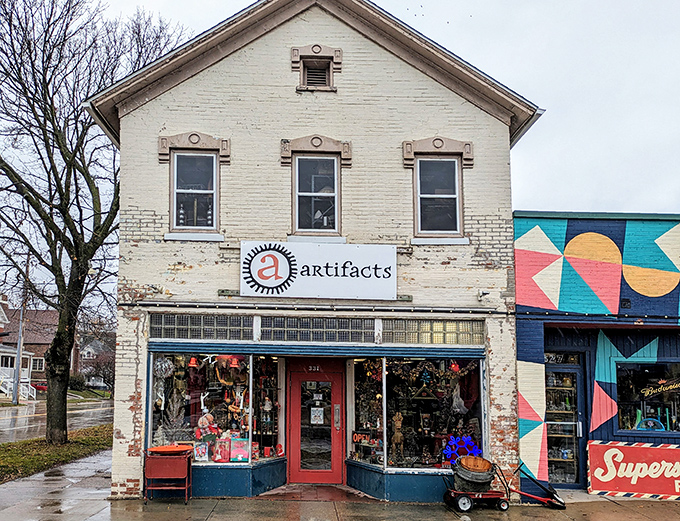 The iconic red door beckons treasure hunters like a portal to the past. Those vintage Radio Flyers aren't just for show!