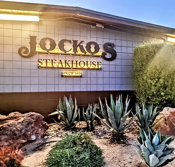 The unassuming exterior of Jocko's belies the culinary magic within. Like finding a treasure chest disguised as a shoebox, this modest façade hides California's steak paradise.