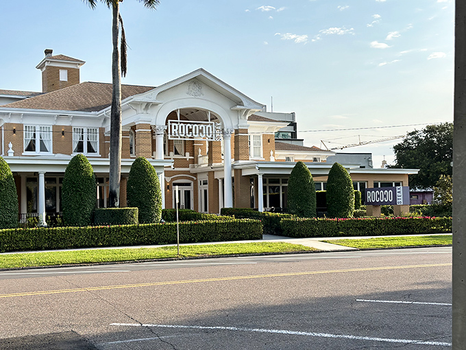 Grand doesn't begin to describe it. Rococo Steak's majestic exterior, with its illuminated columns and elegant façade, promises a dining experience worthy of royalty.