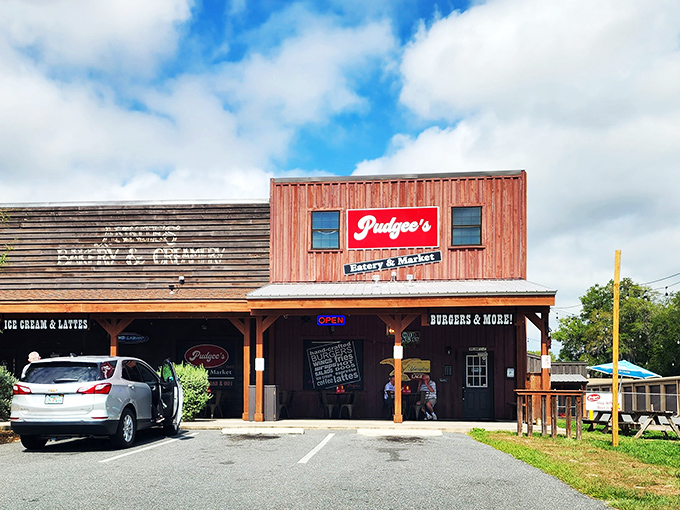 Welcome to Pudgee's, where rustic charm meets culinary delight! This unassuming exterior houses a treasure trove of flavors that'll make your taste buds do a happy dance.