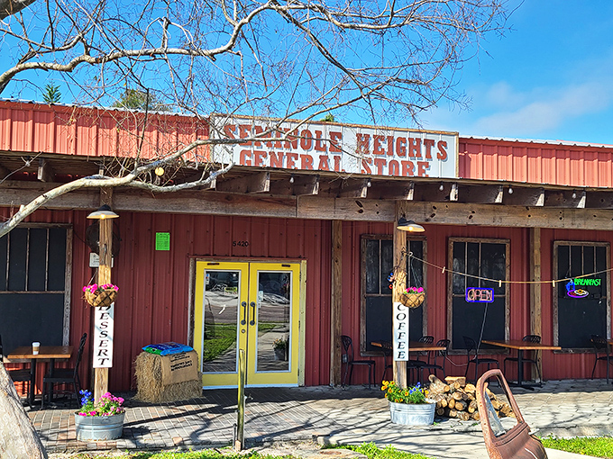 The rustic red exterior of Seminole Heights General Store beckons like a mirage in Tampa's urban landscape—a promise of simple pleasures and extraordinary sandwiches.