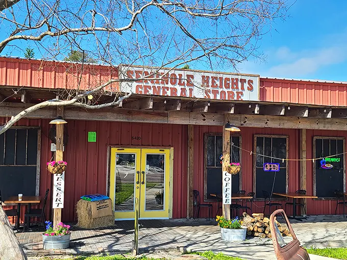 The rustic red exterior of Seminole Heights General Store beckons like a mirage in Tampa's urban landscape—a promise of simple pleasures and extraordinary sandwiches.