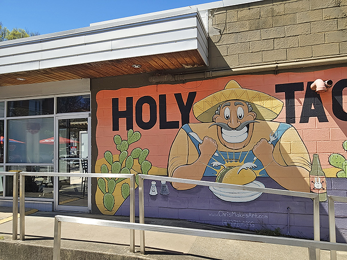 The colorful mural outside Holy Taco isn't just wall decoration—it's a promise of the flavor fiesta waiting inside this East Atlanta Village gem.