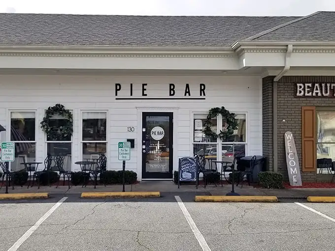 The charming white facade of Pie Bar beckons like a siren song for dessert lovers. Simplicity that promises complexity within.