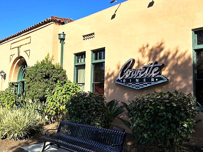 The unassuming exterior plays it cool, like a 1950s heartthrob hiding behind sunglasses. This stucco façade in Liberty Station conceals a time machine within.