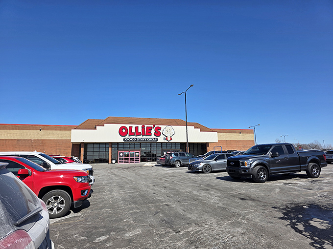 The iconic Ollie's storefront promises "Good Stuff Cheap" beneath that cartoon mascot grin – retail therapy's most honest advertising campaign.