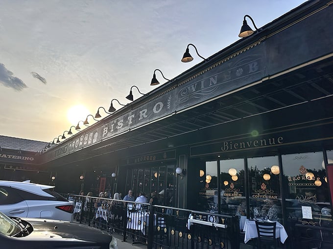 The black and gold façade of Georges French Bistro stands proudly against the Kansas sky, promising Parisian delights with Midwestern hospitality.
