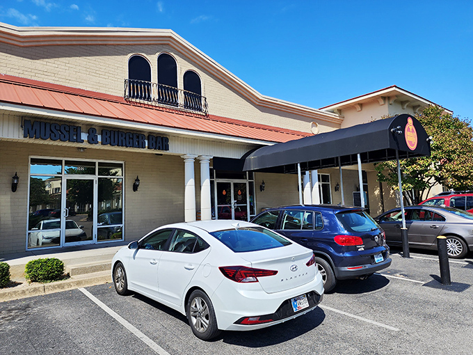 The unassuming exterior of Mussel & Burger Bar belies the culinary treasures within. Like finding a diamond in a strip mall setting.