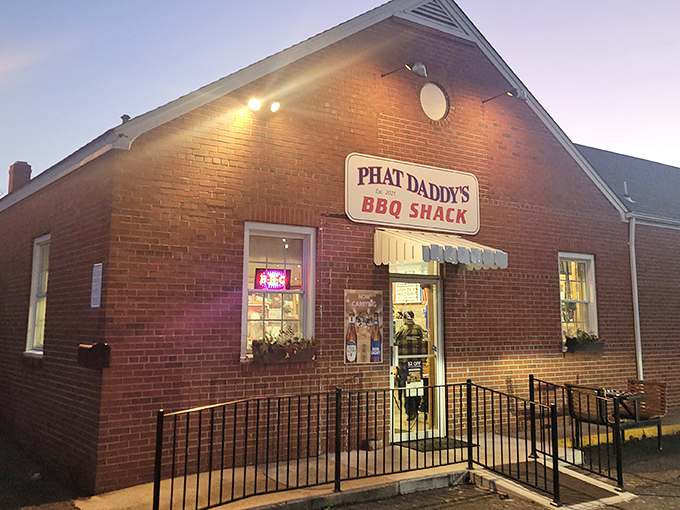 The unassuming brick exterior of Phat Daddy's BBQ Shack proves once again that the best barbecue joints don't need fancy facades—just functioning smokers and faithful followers.