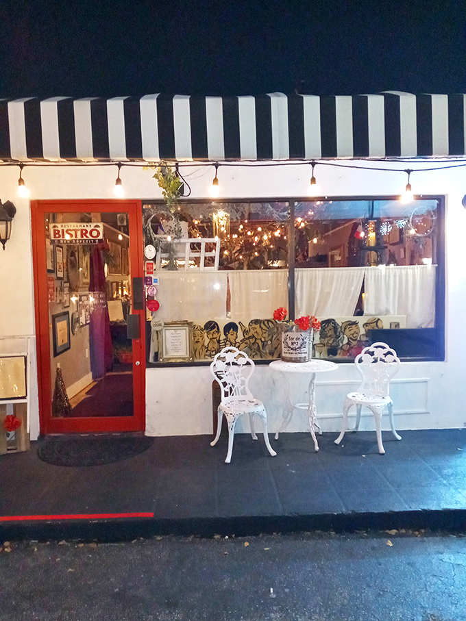 The black and white striped awning and bright red door of La Fresa Francesa isn't just charming—it's like Paris decided to vacation in Hialeah and never left.