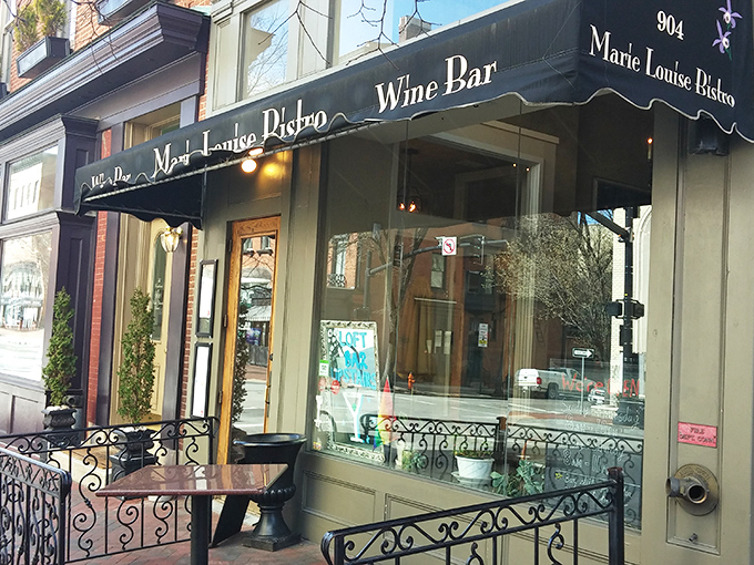 The elegant black awning of Marie Louise Bistro beckons like a sophisticated friend inviting you for a glass of wine and some much-needed conversation.
