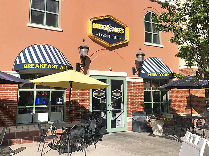 The salmon-colored exterior with its bright yellow "Famous Deli" sign isn't just making promises—it's issuing a delicious challenge to every other sandwich shop in Maryland.