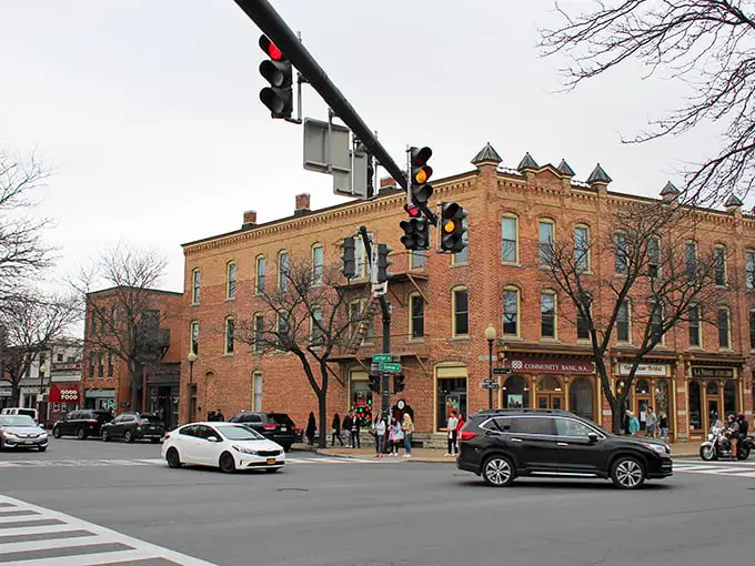Skaneateles Lake stretches like nature's runway, its pristine blue waters flanked by emerald shorelines that promise relaxation and waterfront dining adventures.