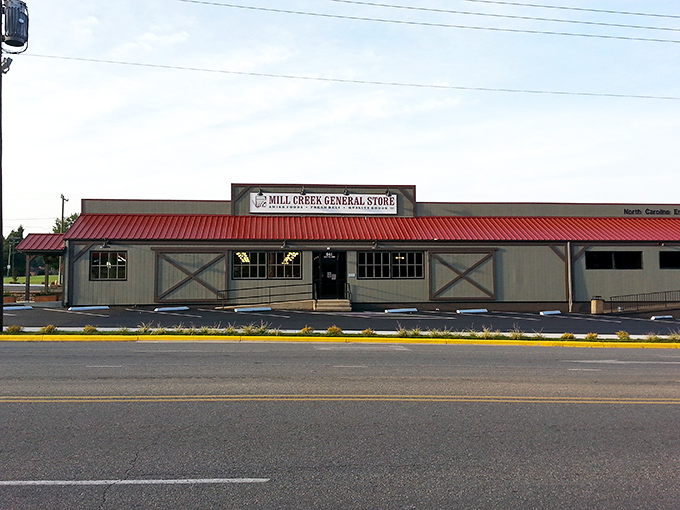 The unassuming exterior of Mill Creek General Store – where culinary treasures hide behind a humble façade that wouldn't look out of place in a Norman Rockwell painting.