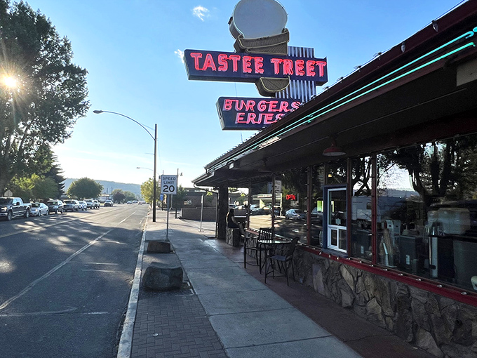 The iconic Tastee Treet sign stands as a beacon of hope for hungry travelers, promising burgers and fries that transcend fast food into the realm of culinary memory-making. 
