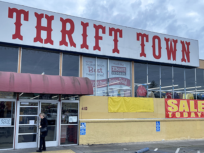 The iconic red Thrift Town sign beckons like a lighthouse for bargain hunters. Sacramento's temple of thrift stands ready for treasure seekers of all budgets.