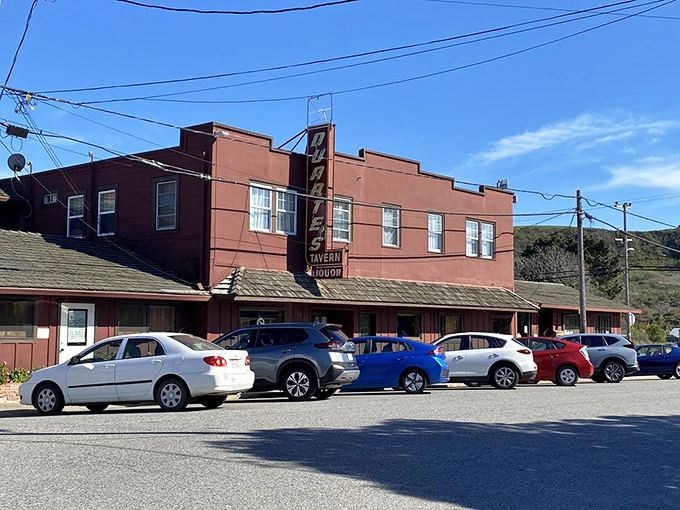 The iconic rose-colored exterior of Duarte's Tavern stands like a culinary lighthouse on Pescadero's main drag, beckoning hungry travelers since 1894.