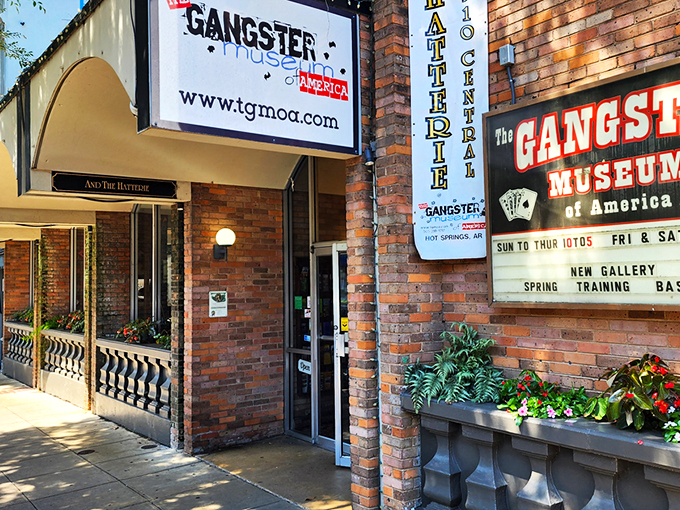The brick facade and vintage signage beckon like a secret password into Hot Springs' scandalous past. Step inside—the tommy guns don't bite!