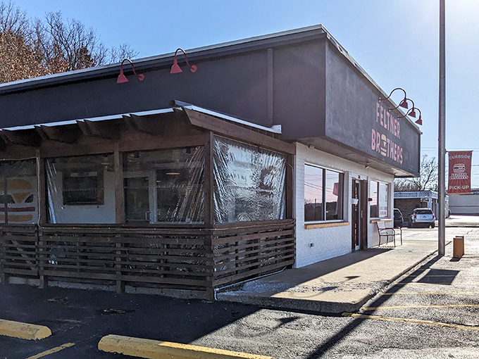 The unassuming exterior of Feltner Brothers stands like a beacon of hope for hungry travelers seeking hot dog salvation in Fayetteville.