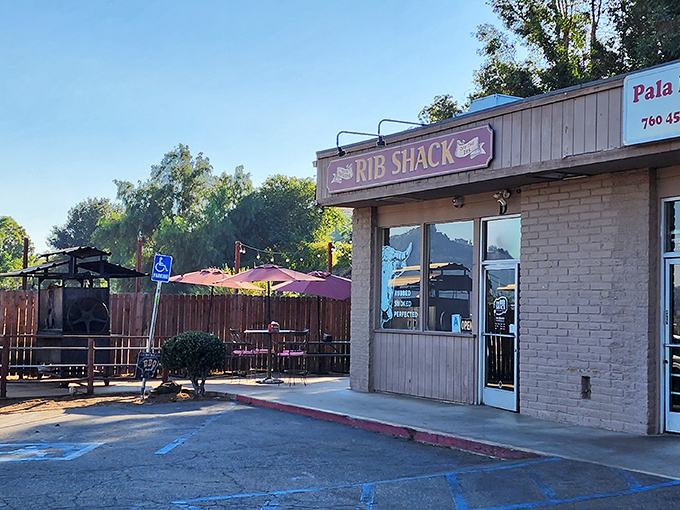 The unassuming storefront that houses barbecue greatness. Like finding a diamond in a strip mall, The Ribshack Que's modest exterior belies the smoky treasures within.