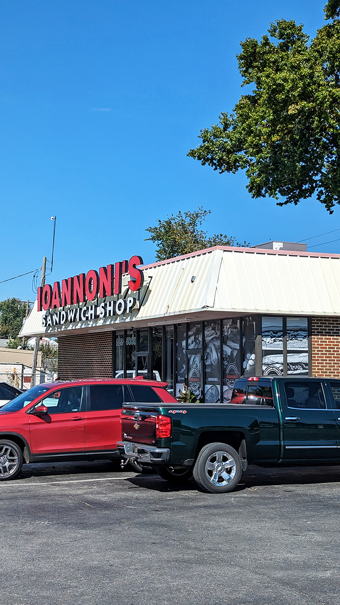 The bright red Ioannoni's sign stands out like a culinary lighthouse, guiding hungry travelers to sandwich nirvana on even the bluest Delaware day.