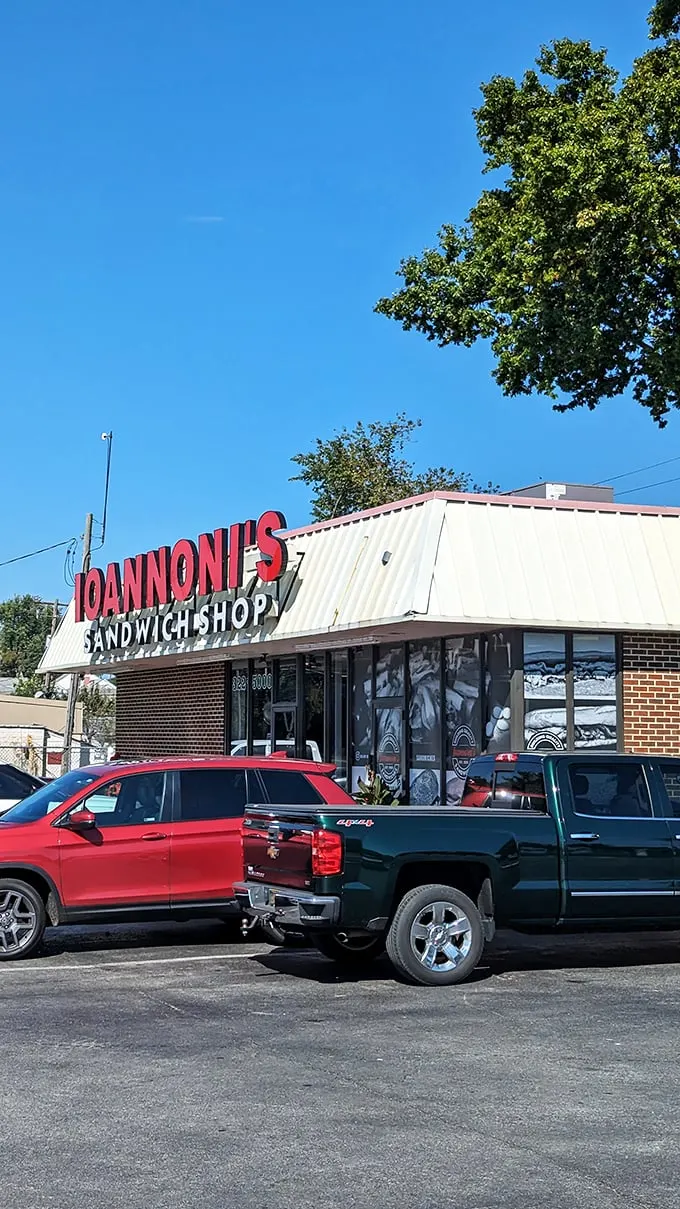 The bright red Ioannoni's sign stands out like a culinary lighthouse, guiding hungry travelers to sandwich nirvana on even the bluest Delaware day.