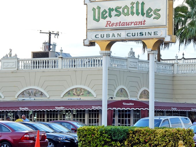 The palace of Cuban cuisine stands regally on Calle Ocho, its yellow façade and burgundy awning beckoning hungry pilgrims like a delicious mirage.
