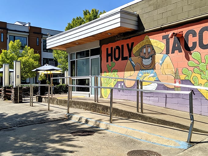 The colorful mural outside Holy Taco isn't just wall decoration—it's a promise of the flavor fiesta waiting inside this East Atlanta Village gem.