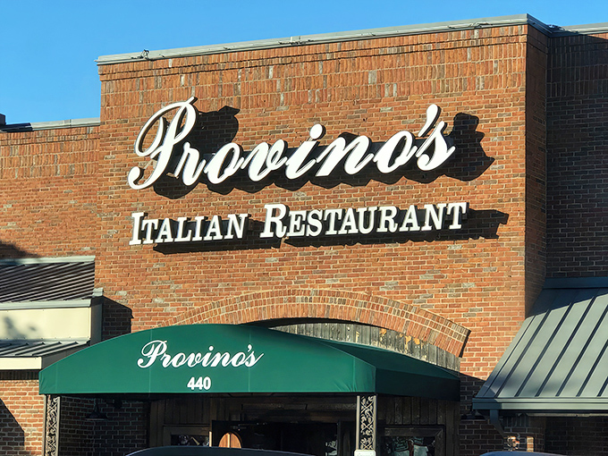 The iconic brick façade and emerald awning of Provino's stands as a beacon of hope for the pasta-deprived masses of Kennesaw.