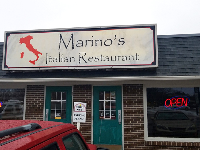 The iconic Marino's sign with Italy's boot in red says it all: authentic Italian awaits behind that turquoise door in Johnston.