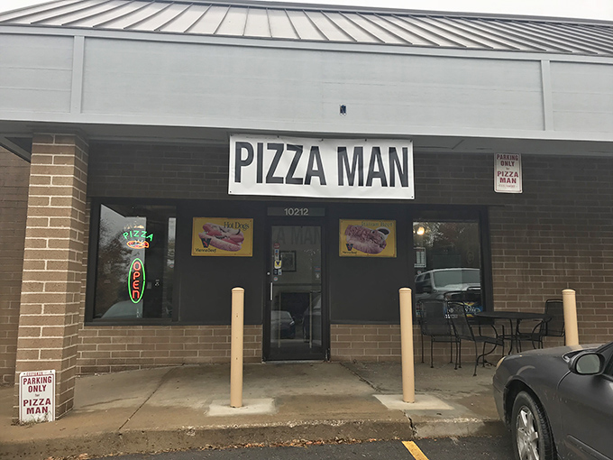 The unassuming storefront of The Pizza Man in Lenexa might fool you, but locals know this brick façade hides Chicago-style treasures worth the pilgrimage.