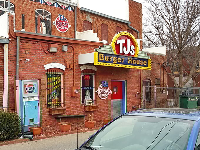 That iconic yellow and red sign against classic brick isn't just restaurant signage—it's a beacon of burger hope for hungry Kansans everywhere.