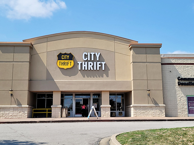 The beige fortress of bargain hunting beckons with its shield-like logo—your first clue that treasure awaits inside this Overland Park institution.