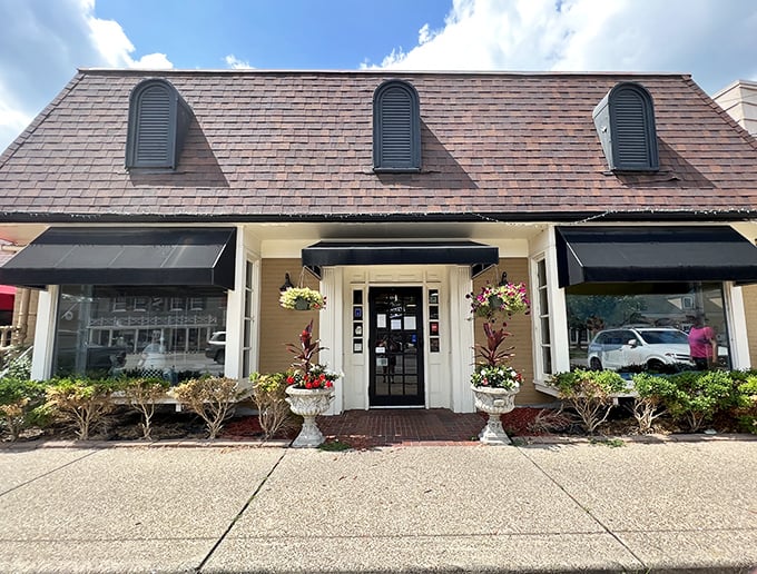 The unassuming yellow brick façade of Lotsa Pasta beckons like an old friend, promising Mediterranean treasures behind that classic black door.