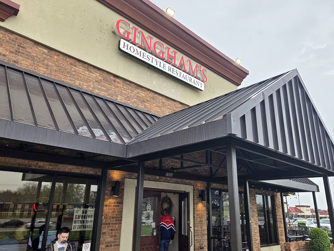 The brick exterior of Gingham's proudly announces "OPEN 24 HRS" – a beacon of hope for hungry night owls and early birds alike.