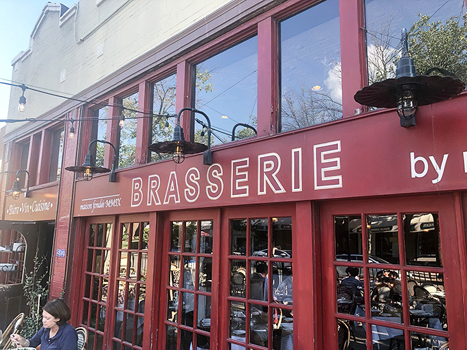 The burgundy façade beckons like a Parisian street corner transplanted to St. Louis, complete with those quintessential French bistro tables waiting for your arrival.